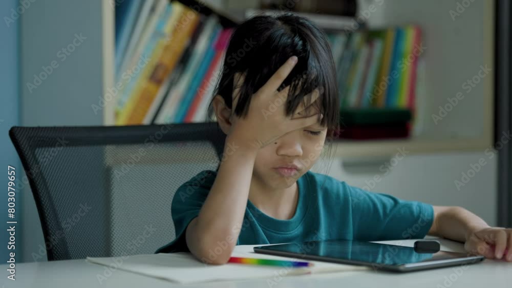 Asian cute kid girl, age 8+, is stressed out about homework she has to ...