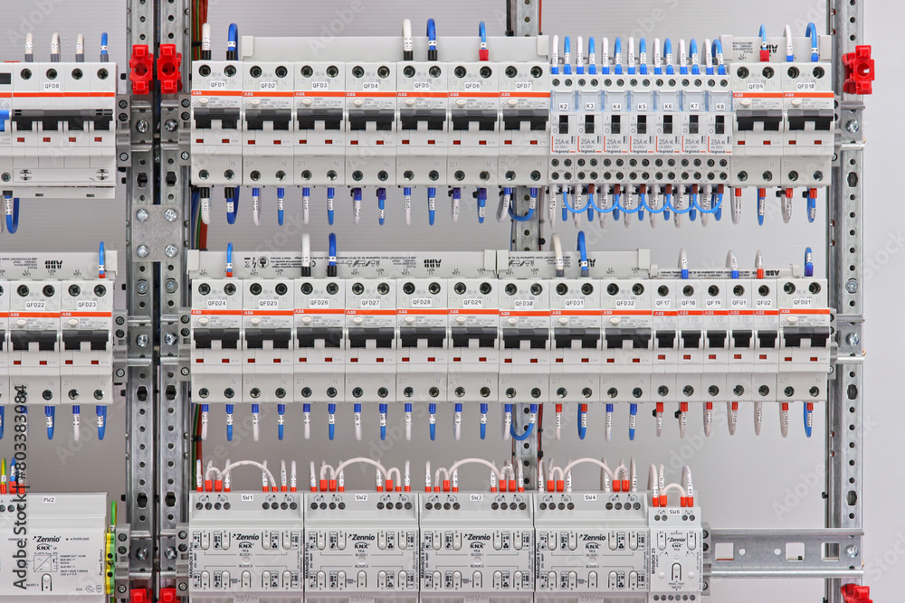 An electric switchboard with modules for protection and control of ...