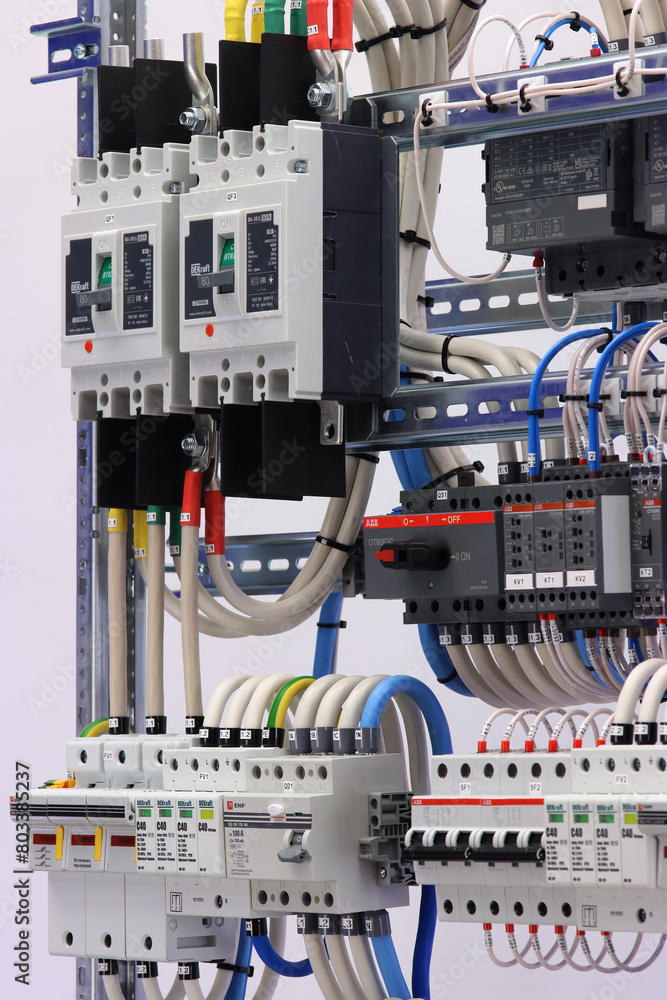 An electric switchboard with modules for protection and control of ...