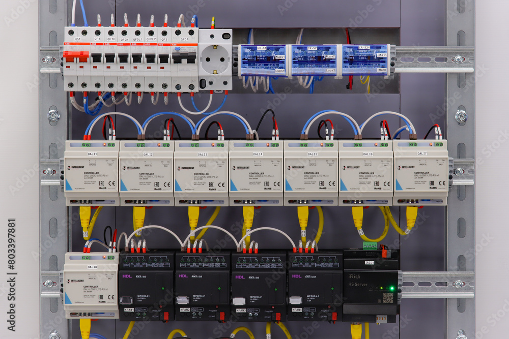 Electronic control modules for apartment automation are installed in an ...