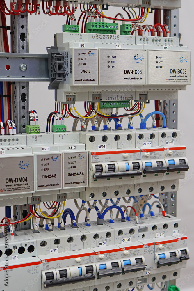 Electronic control modules for apartment automation are installed in an ...