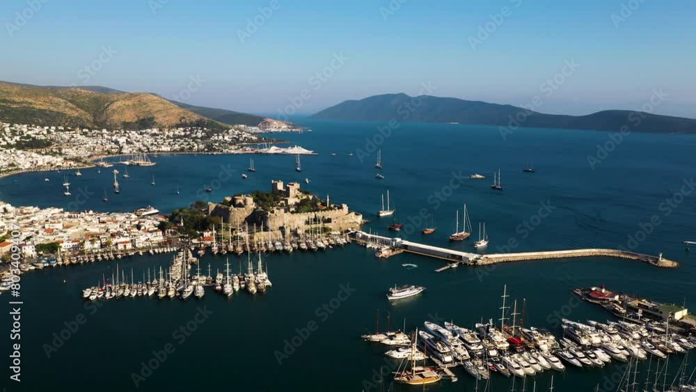 Bodrum city aerial shot. Aegean sea, traditional white houses, flowers ...
