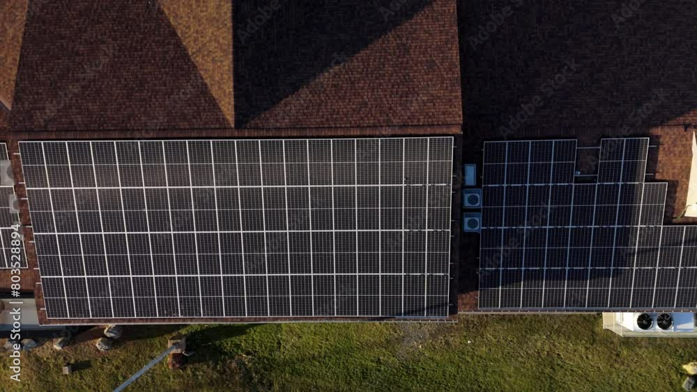 Top view of solar panels installed on the roof of the library. Beyond ...
