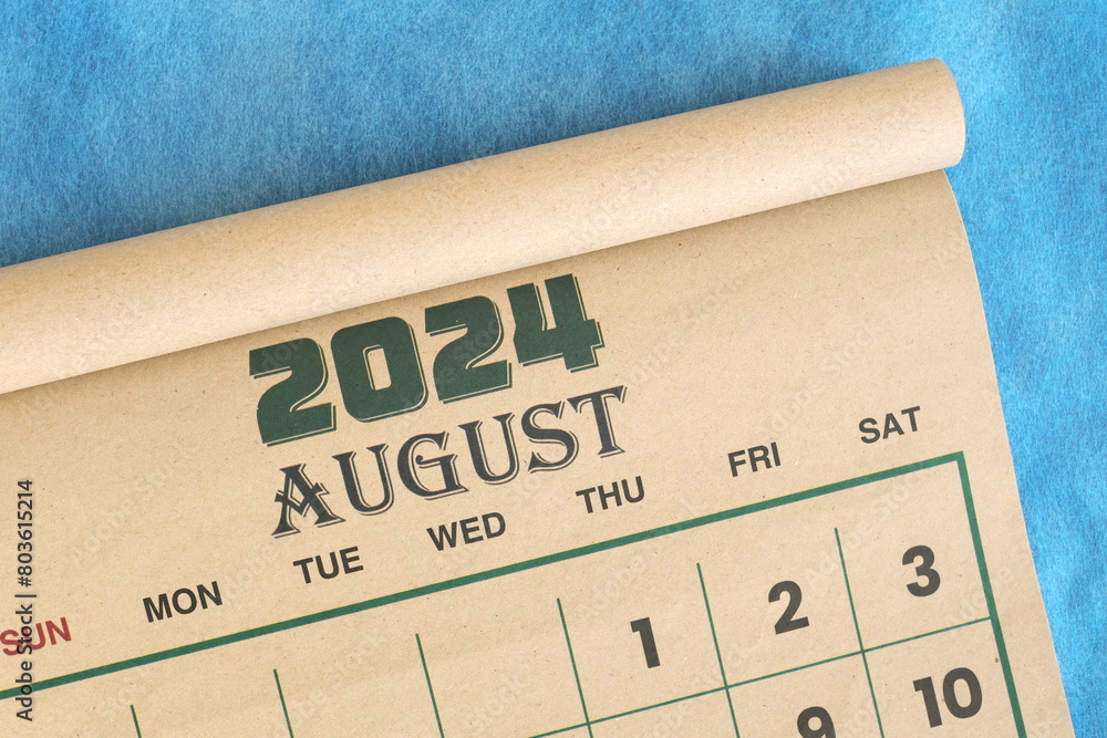 August 2024 calendar flat lay in blue background with copy space. Stock ...