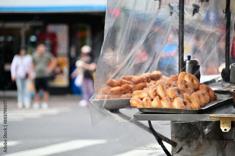 Close-up of Taiwanese fried food stall: classic treats on display. On ...