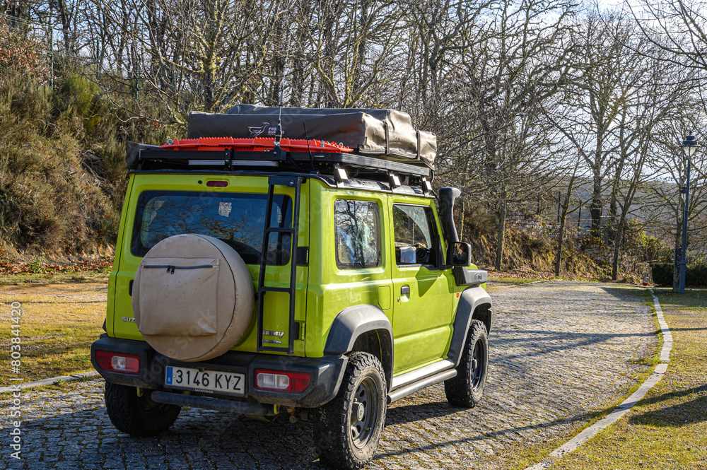 Suzuki Jimny green yellow, phosphor, ready for an overland trip, with ...