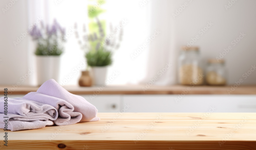 Empty wooden table top with blurred white laundry room interior ...
