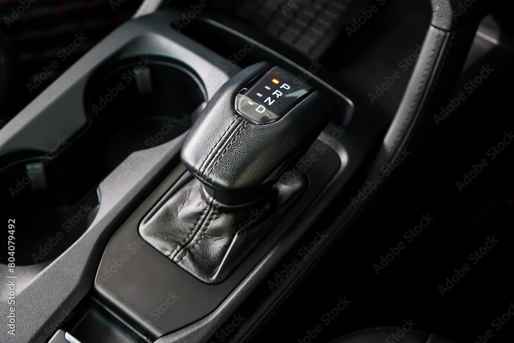 automatic transmission shift selector in the car interior. Closeup a ...