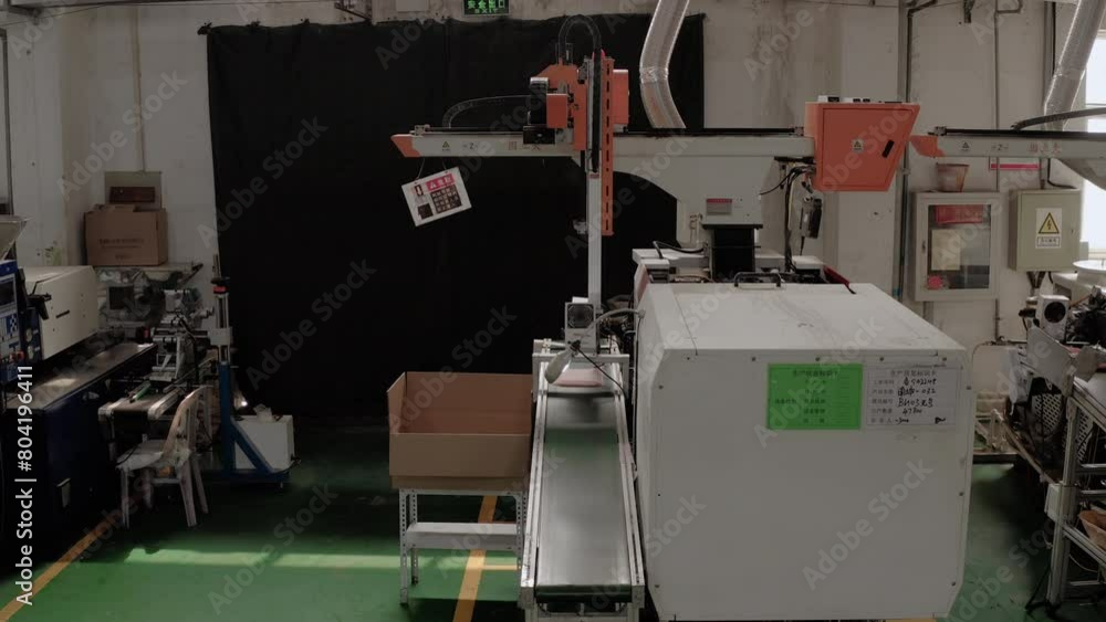 Inside a Chinese factory with an automated production system. Plastic ...