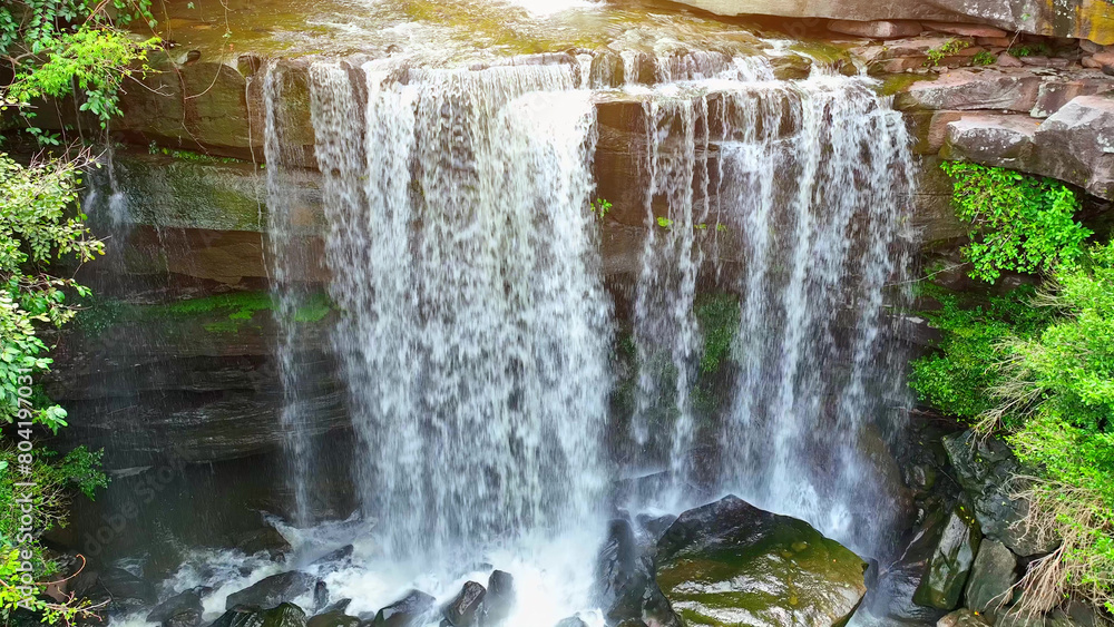 Drone captures stunning tropical waterfall: Majestic cascade from ...