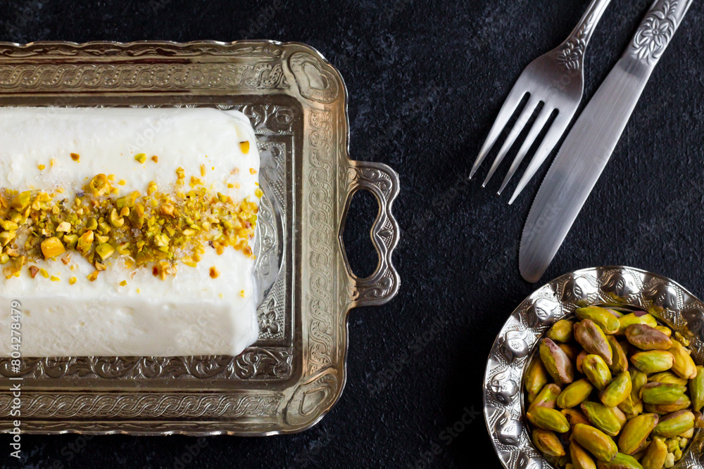 Traditional Turkish Maras Cut Ice Cream,on a silver tray with cutlery ...
