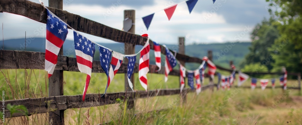 Red, white, and blue bunting draped across fences , professional ...