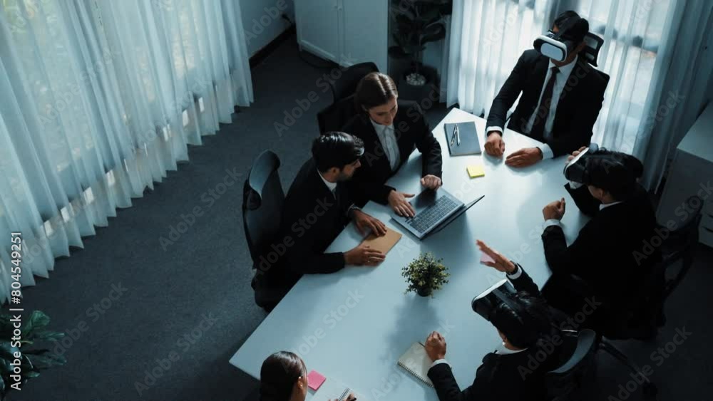 Top view of manager working on laptop and sending data analysis to ...