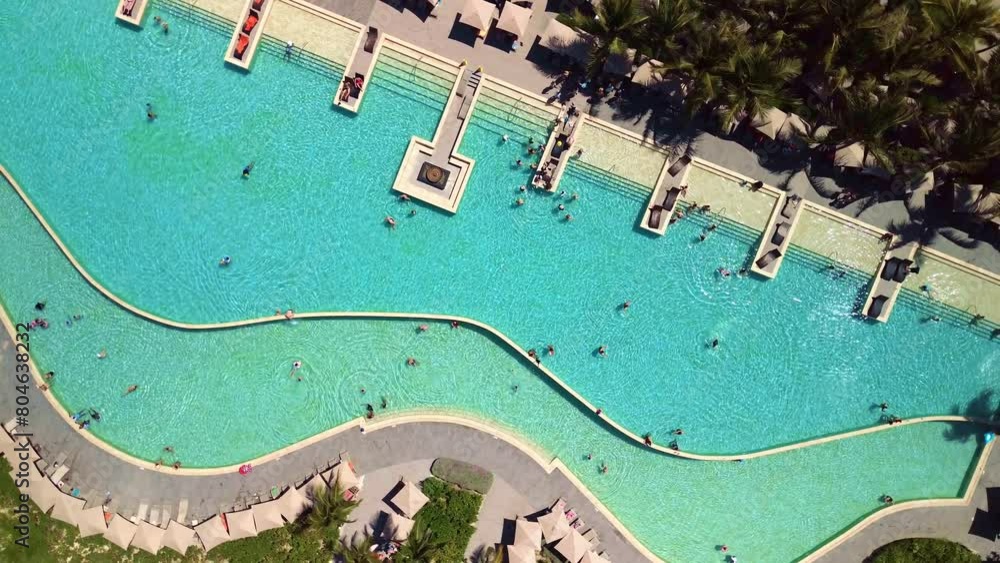 Top down aerial view of luxurious hotel in the tropics boasts a ...