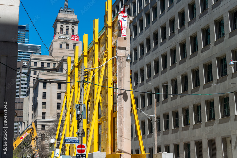 preserving the past: a historic building facade awaits restoration ...