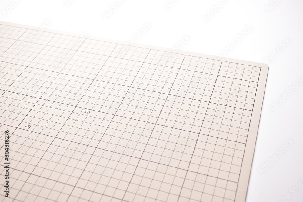 gray cutting mat board on white background with line and scale measure ...