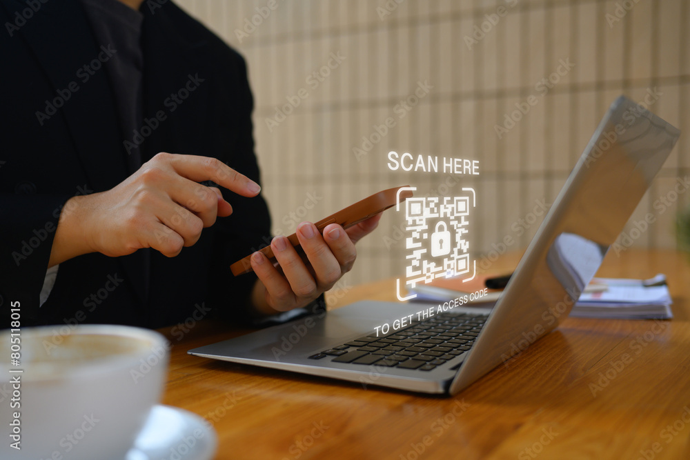 Businessman scanning QR code with smart phone for payment and ID ...