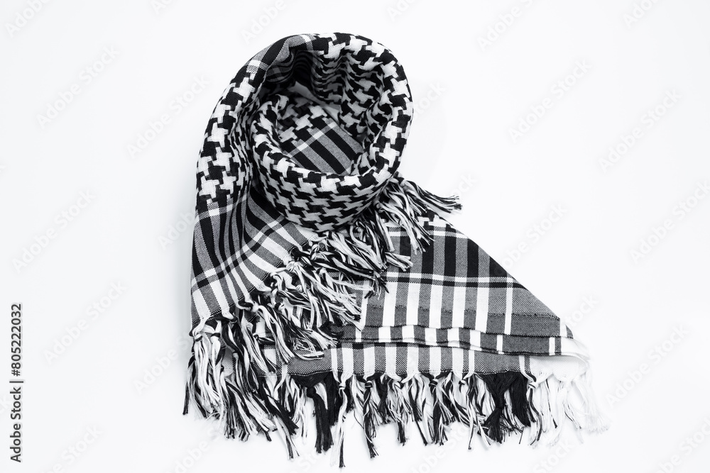 A traditional pattern head-tied garment 'Keffiyeh' or 'Puşi' on a white ...