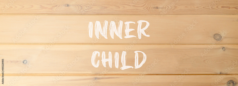 Inner child symbol. Concept words Inner child on beautiful wooden wall ...