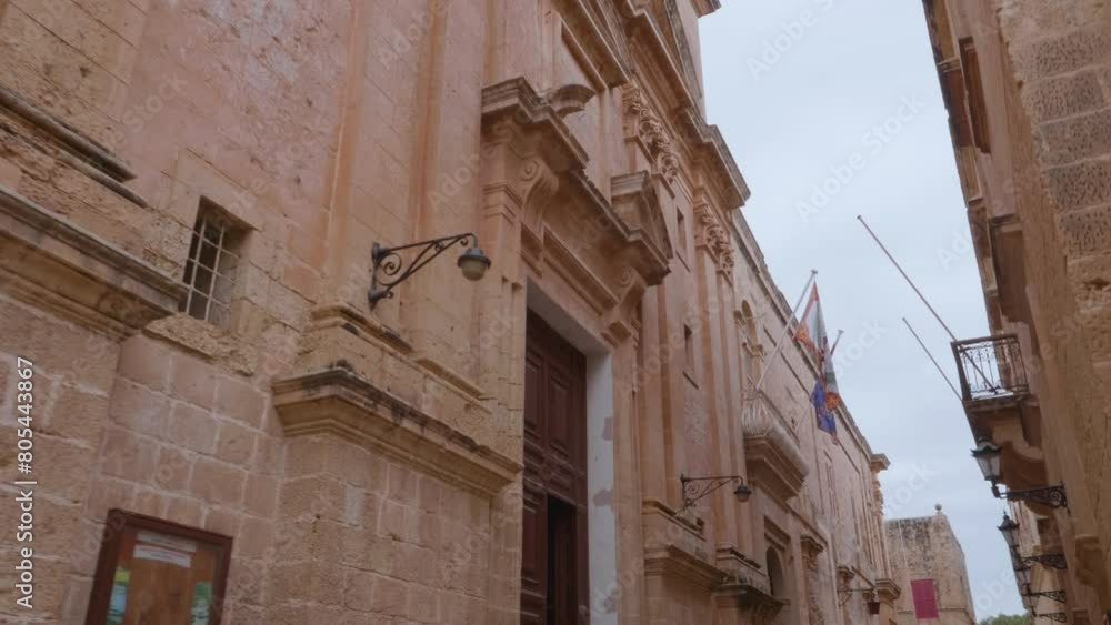 A walking shot showing a statue of the Virgin Mary holding Baby Jesus ...