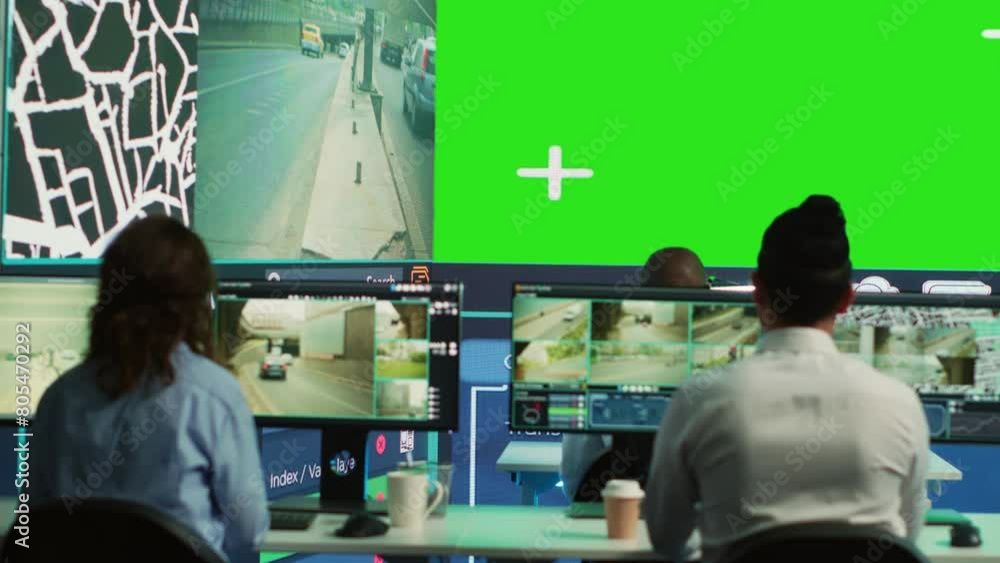 Group of employees monitoring delivery trucks routes with an isolated ...