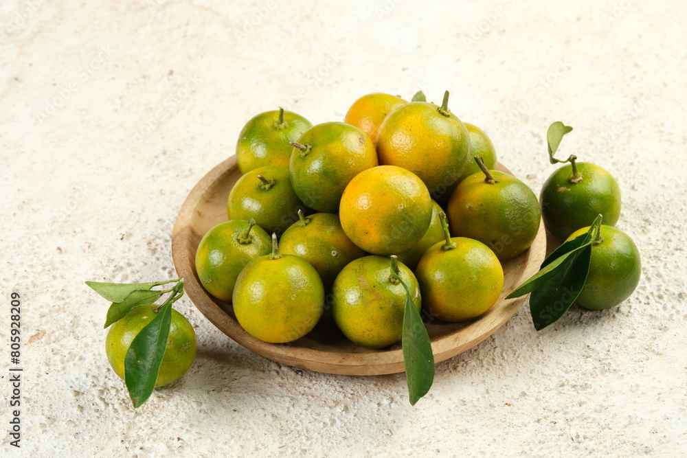 Calamansi orange ( citrus microcarpa), also known as lemon cui or jeruk ...