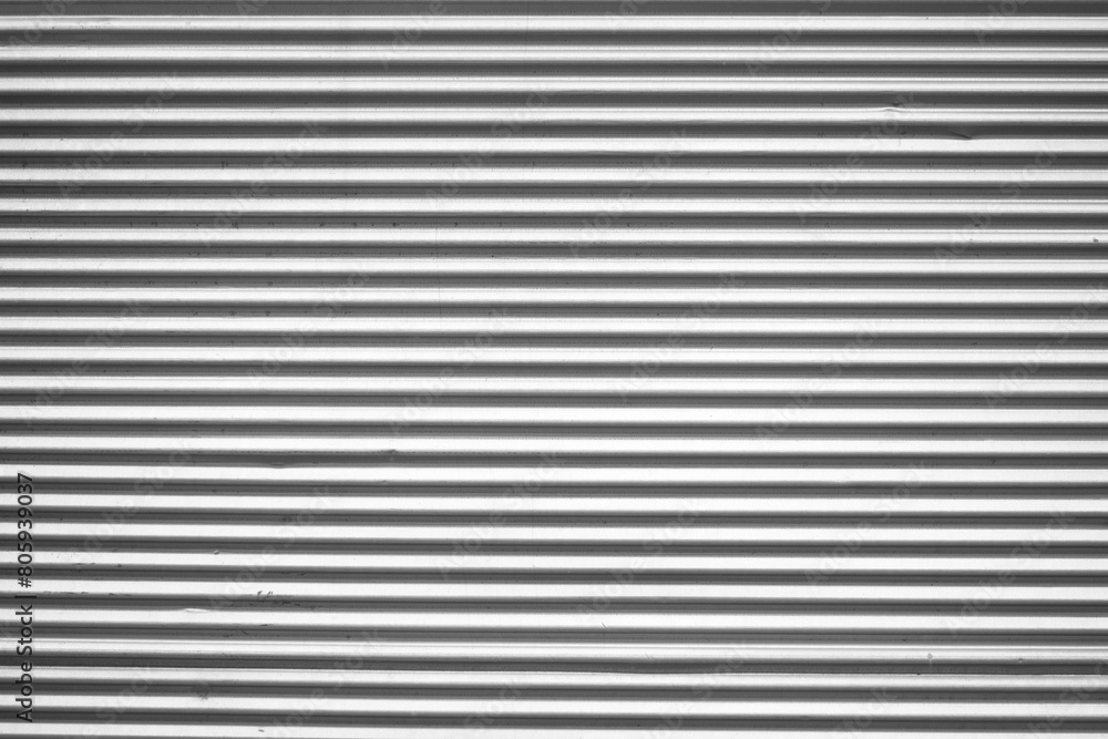 Silver tin iron corrugated wall with horizontal stripes from a metal ...