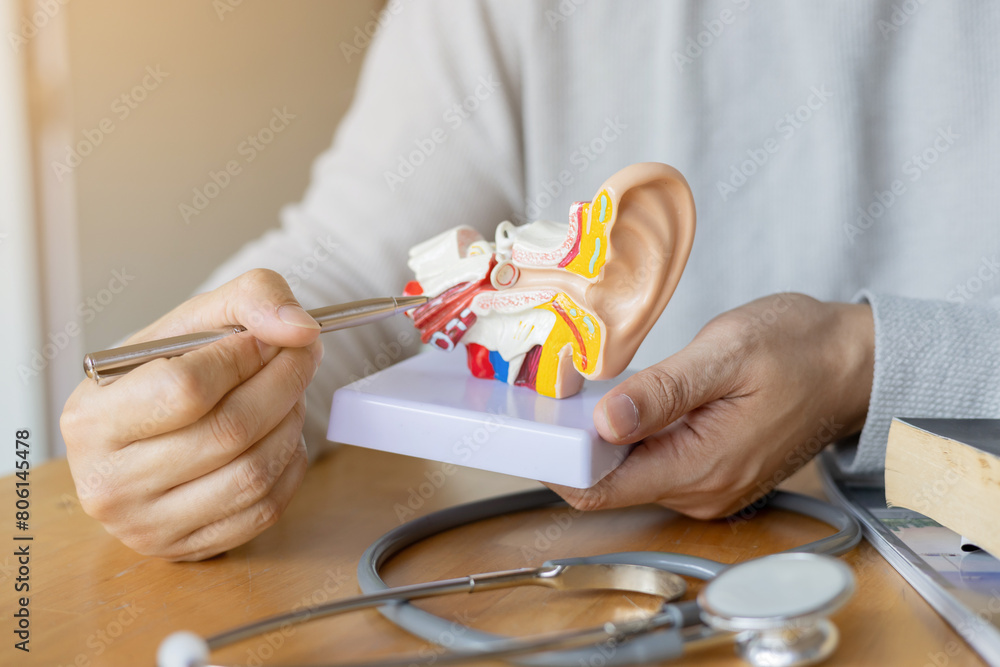 close up professional otolaryngologist talking to patient about symptom ...