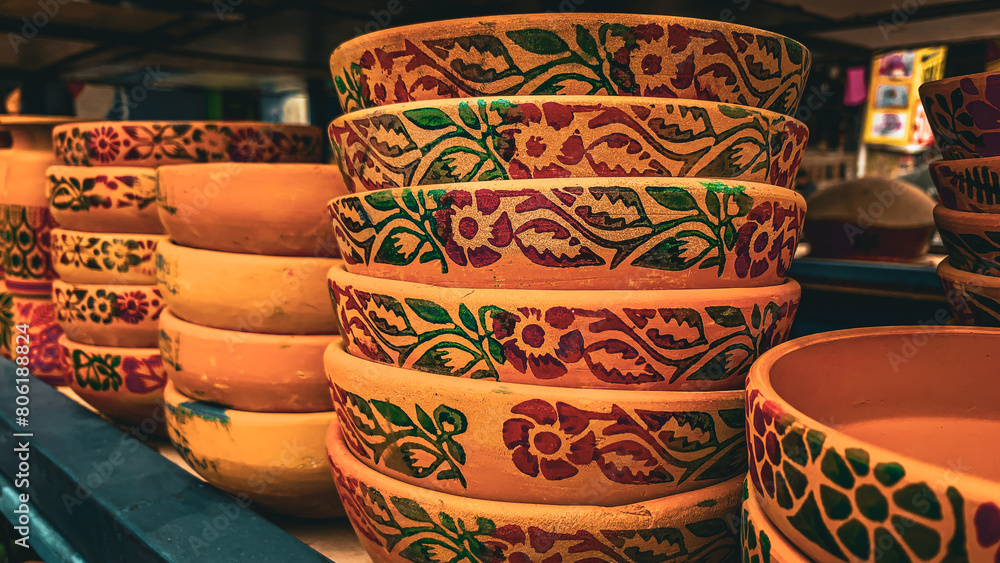 Handmade ceramic clay-based earthenware used for drinking and cooking ...