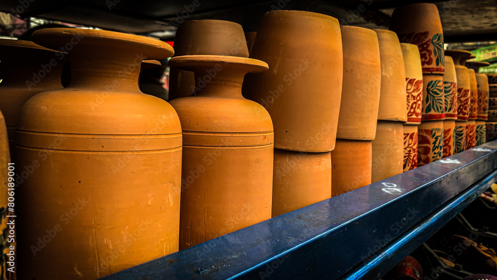 Handmade ceramic clay-based earthenware used for drinking and cooking ...