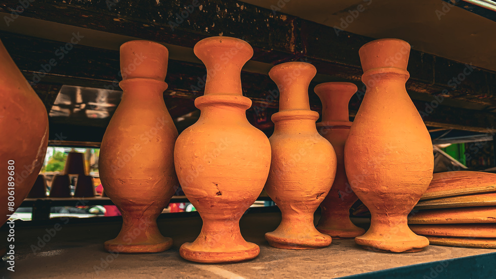 Handmade ceramic clay-based earthenware used for drinking and cooking ...