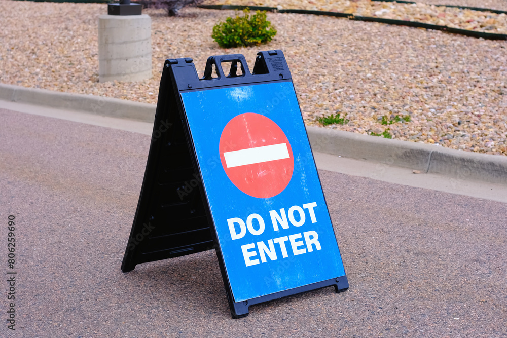 Do not enter stop sign on blue plastic portable folding sidewalk double ...