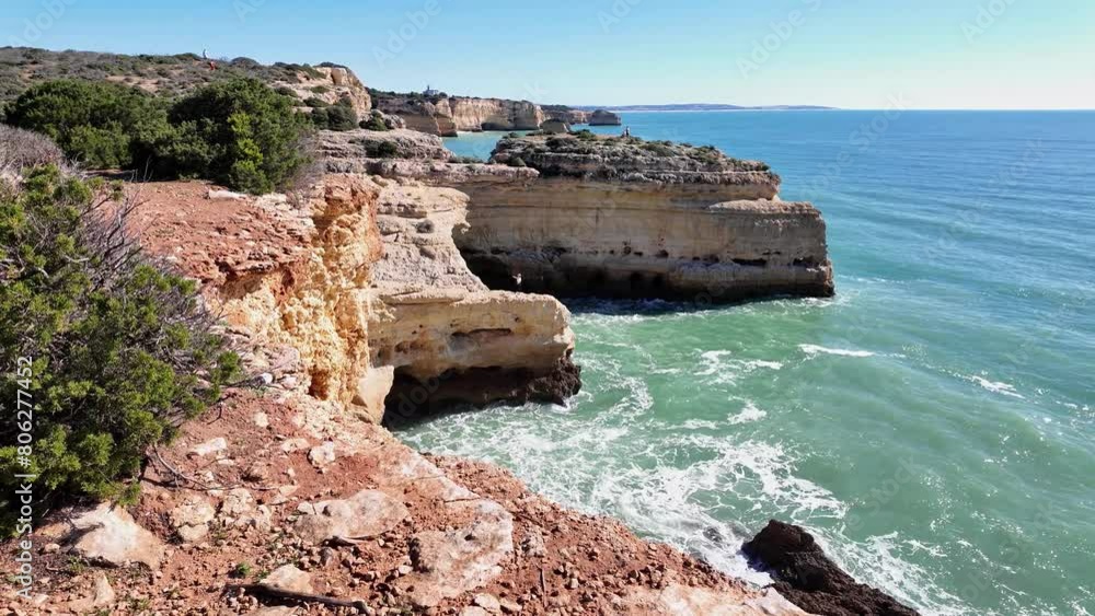 Praia da Marinha Beach among rock islets and cliffs seen from Seven ...