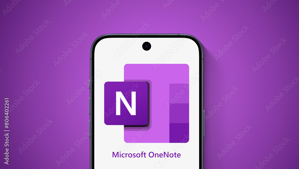 OneNote logo displayed on a modern smartphone standing on a desk ...