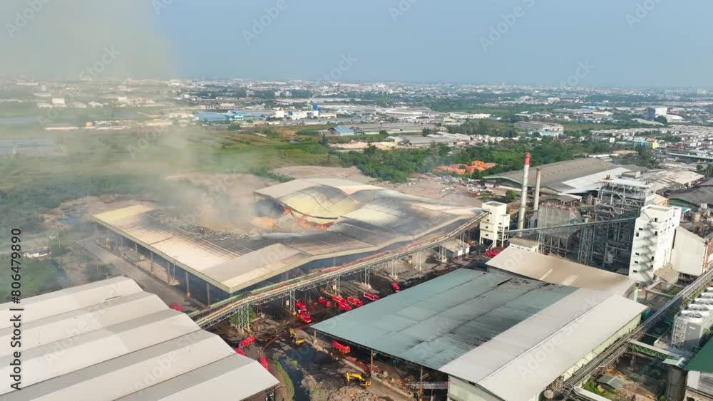 The industrial inferno rages on, as brave firefighters battle ...