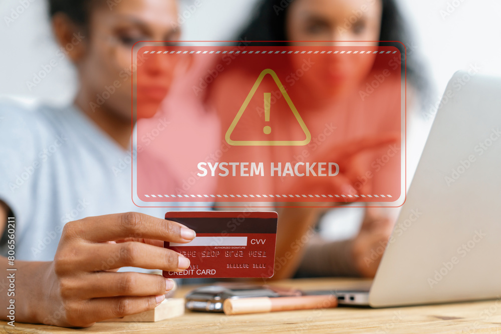 Foto de Customer watching hologram interface warn danger of credit card ...