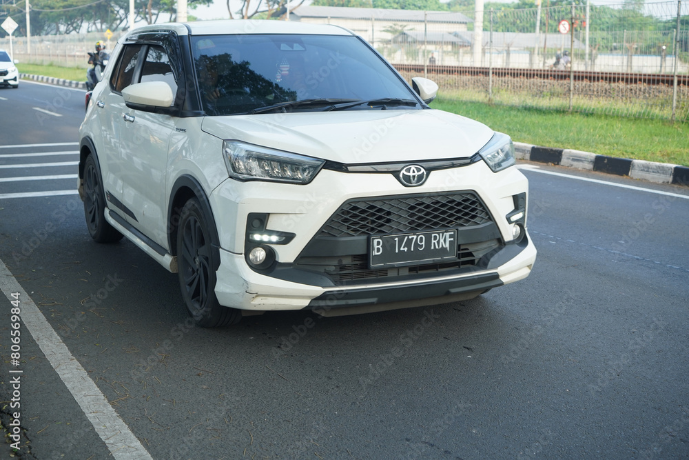 White color SUV car Toyota Raize, on the road at Cengkareng, banten ...