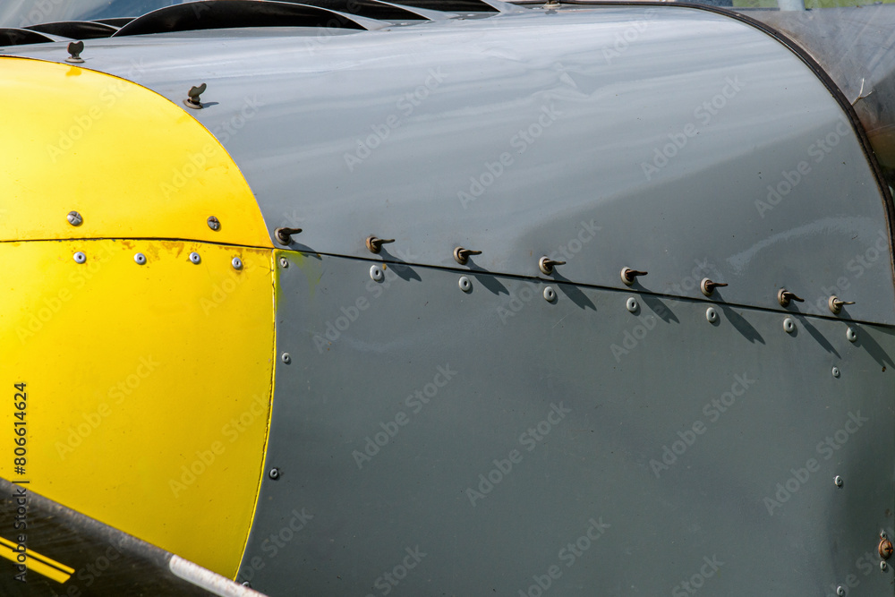 Antique aircraft skin texture. Metal parts, rivets and part of the ...