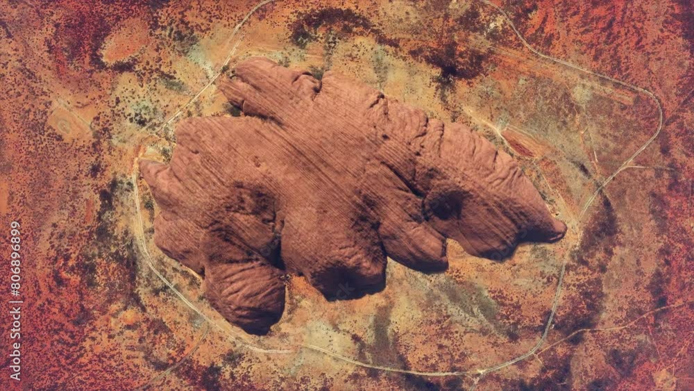 Vidéo Stock Aerial top down view of Uluru also known as Ayers Rock is a ...