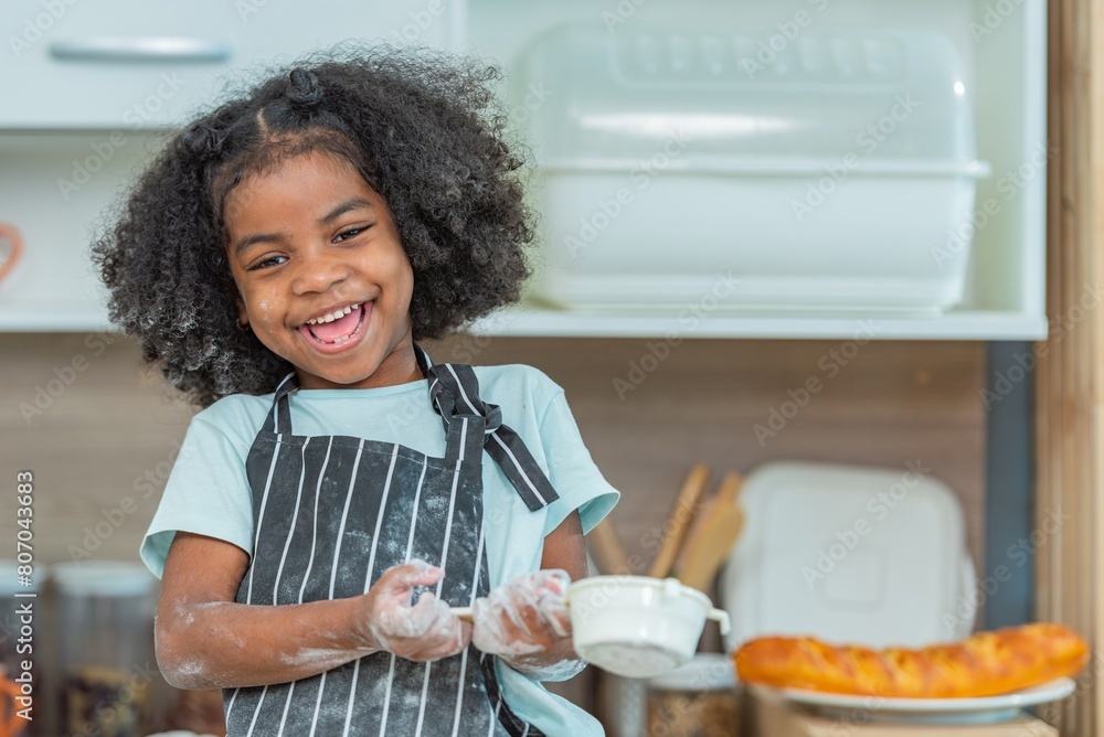 african afro black daughter kids sifting flour powder and sprinkling ...