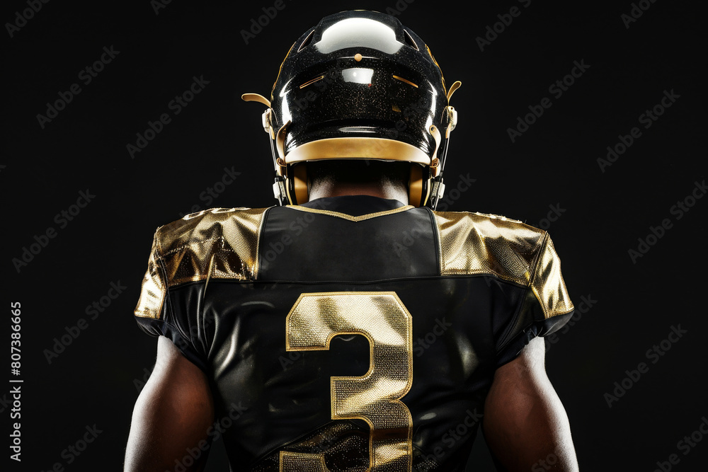 Determined Athlete in Black and Gold Football Gear Facing Away, Poised ...