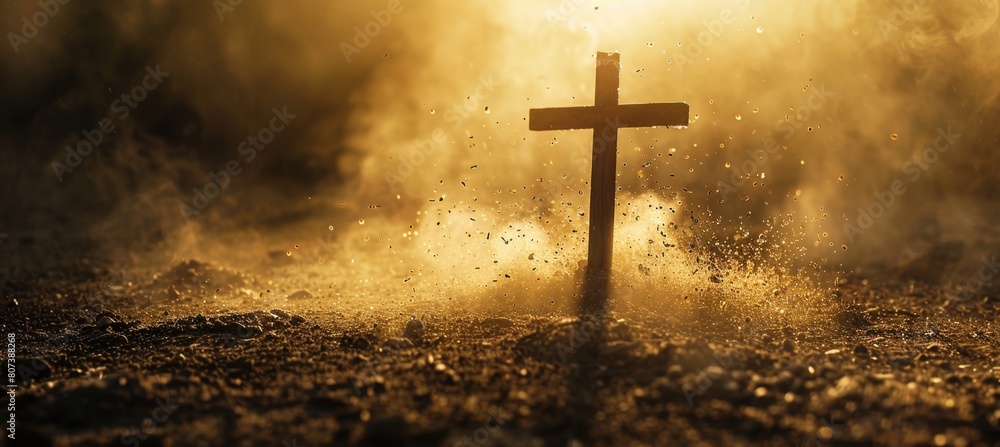 wooden cross is placed on the ground, surrounded by golden light and ...