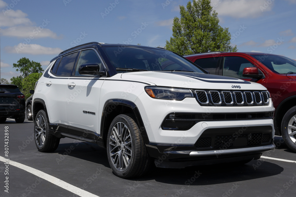 Jeep Compass 4X4 display at a dealership. Jeep offers the Compass in ...