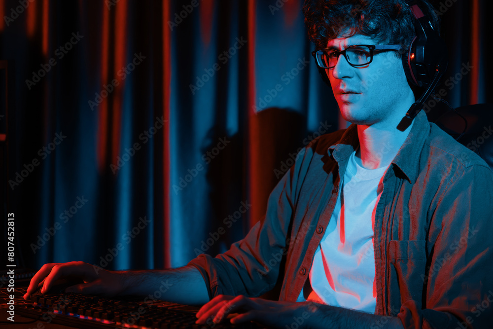 Stressful young gaming streamer team concentrated with Esport online on ...