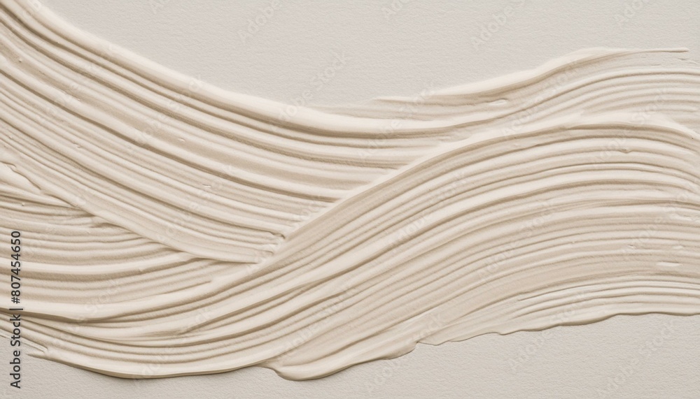 The wavy creamy texture of beige paint in smooth curves for a neutral ...