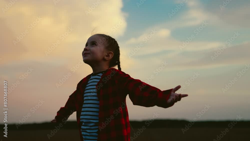 little child kid girl raises her hands sky sunset, religion praying ...