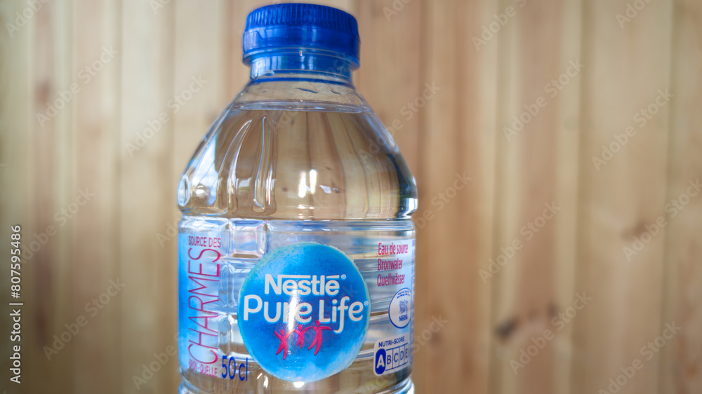 Nestle Pure Life detail of the label of a bottle of spring water logo ...