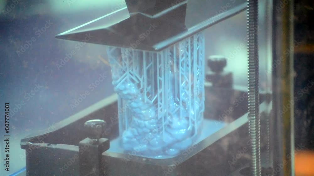 3D printer working process. 3D printing. Stereolithography ...