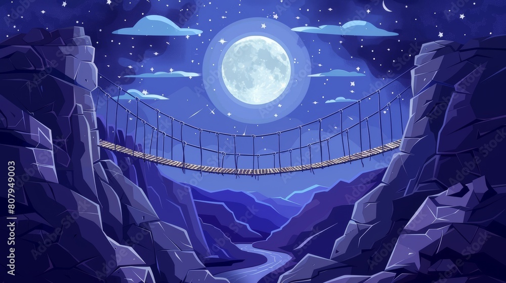A rope bridge between cliffs in a mountain range in the dark ...