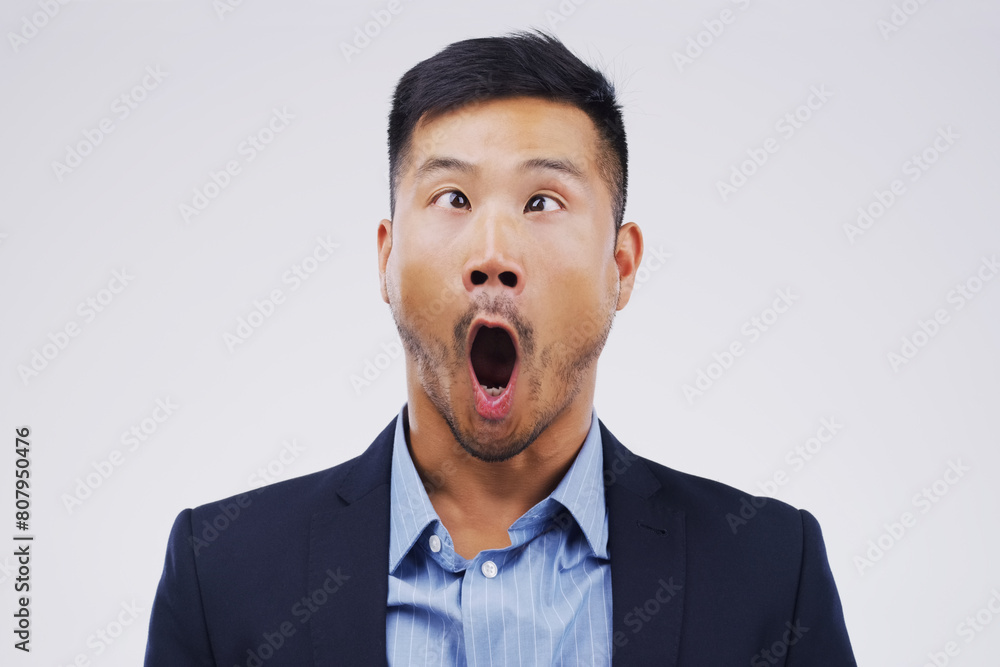 Businessman, crazy and wow face in studio for emoji, comedy and fun by ...